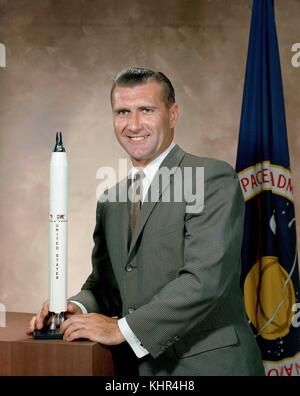 NASA Apollo 12 astronaut Dick Gordon poses in front of the lunar lander ...