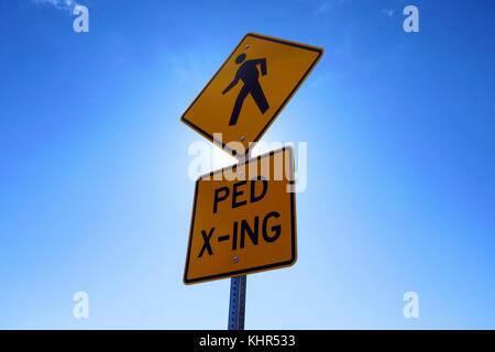 Bright yellow road sign, attention, pedestrian crossing in 30 meters ...