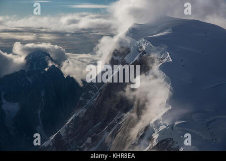 Aerial view of Moose's Tooth and the Alaska Range on a sunny day in ...
