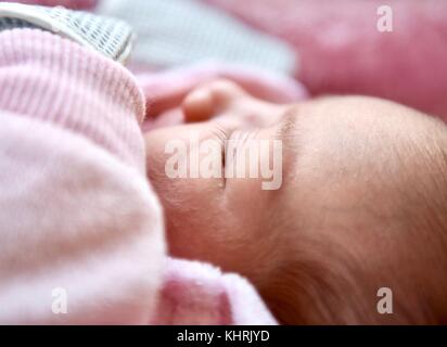 Baby girl with long eyelashes Stock Photo - Alamy