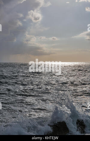 Stormy sea wave splash at dusk Stock Photo - Alamy