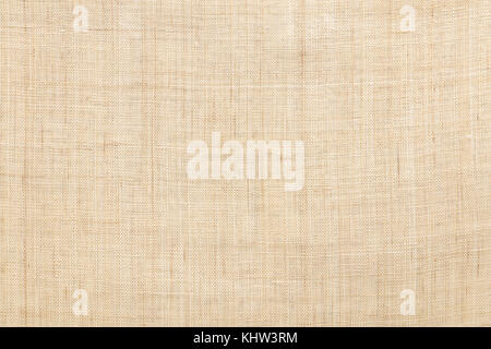 beige colored hemp cloth texture with blue sky background Stock Photo ...