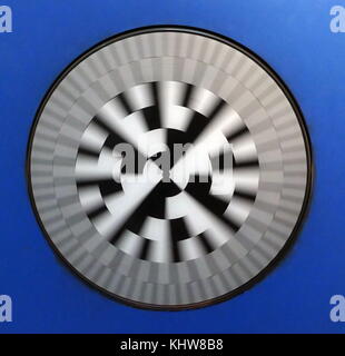 Benham's Disk (Benham's Top) a top painted with the pattern shown. When ...