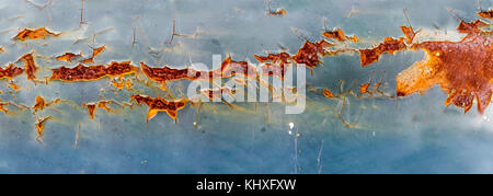 rust and erosion of metal surface by rain water and different ...