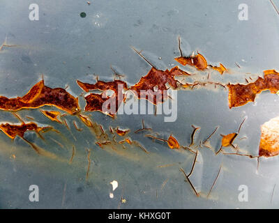 rust and erosion of metal surface by rain water and different ...
