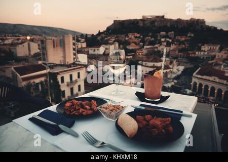 Dinner at rooftop with the view of Acropolis in Athens, Greece Stock ...