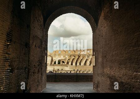 Archway in Colosseum, the world known landmark and the symbol of Rome ...