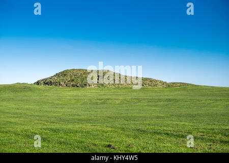 A round Bronze Age barrow tumulus at Barrowfields in Newquay Cornwall ...