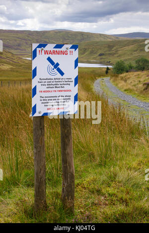 Sign in English and Welsh appearing to warn that sheep are satillite ...