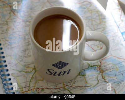 Group of different cups and mugs with coffee and tea drinks on a light ...
