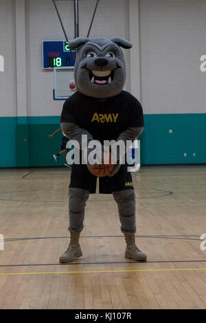 Rocky, the 3rd Infantry Division mascot, poses with a statue of himself ...