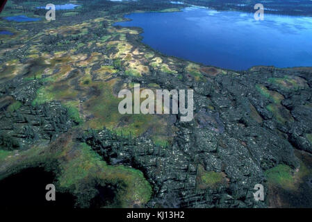 Six Mile Lake and Mud River are shown in a scenic landscape. The clear ...