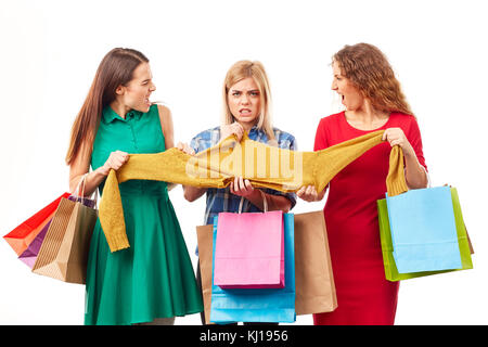 Fighting over piece of clothing Stock Photo - Alamy
