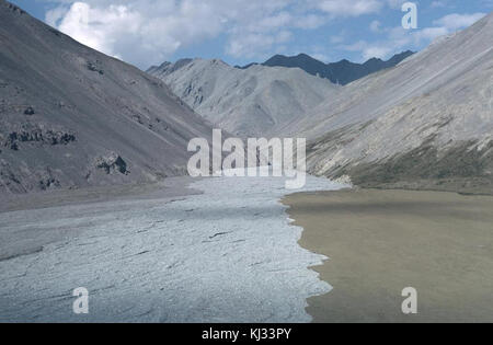 The Chandalar River flowing through the mountains. Subjects: Scenics ...