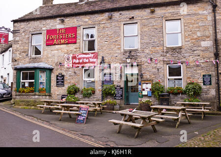 Visitors to Grassington in The Yorkshire Dales, England, admire the ...