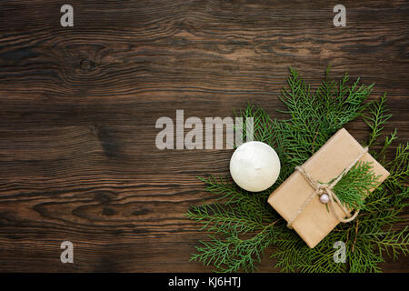 Christmas gift boxes, decoration and fir tree branch on blue background ...