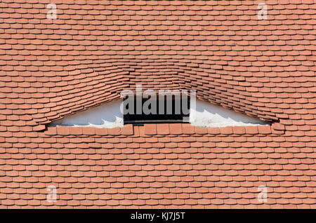 Sibiu eye, a small eye shaped attic windows in the rooftops of various ...