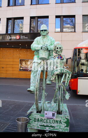A green street costume artist beggar in Barcelona, Spain Stock Photo ...