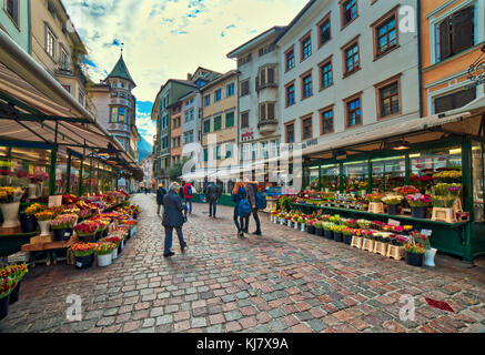BOLZANO, ITALY - JANUARY 30: tourists and locals visiting the stalls in ...