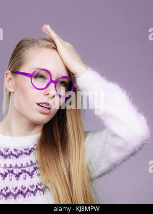 Face expressions, disregard, stupid behavior concept. Nerd blonde woman ...