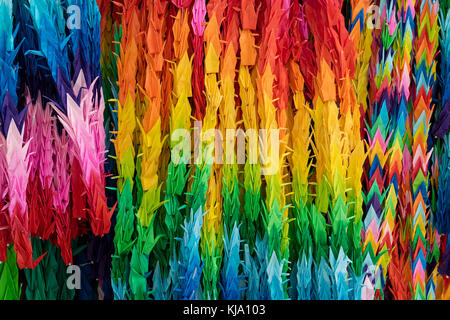 Colourful paper crane birds Origami paper hanging at Buddhist temple or ...