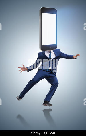 Mobile phone zombie under the influence of smartphone Stock Photo - Alamy