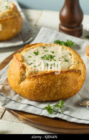 New England Clam Chowder in a sourdough bread bowl. Photographed in ...