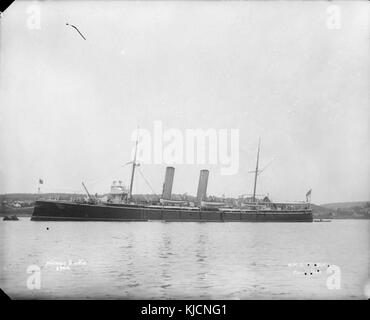 The image captures a British warship docked in the harbor of Amsterdam ...