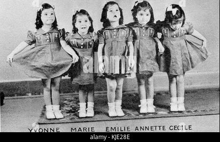 A famous photograph of the Dionne Quintuplets, the first quintuplets ...