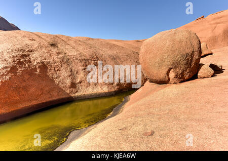 Water hole in Spitzkoppe in the Namib desert of Namibia Stock Photo - Alamy