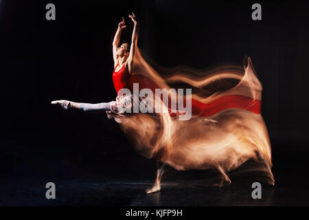 Beautiful gracious woman showing her performance Stock Photo - Alamy