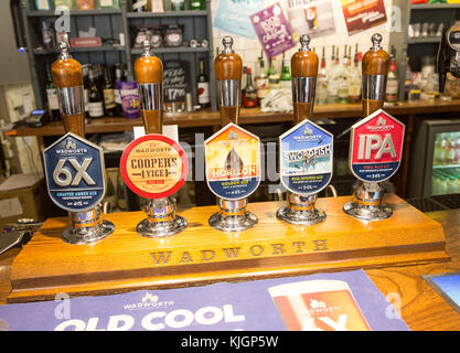 Beer pump labels for Wadworth beers inside the Green Dragon pub ...