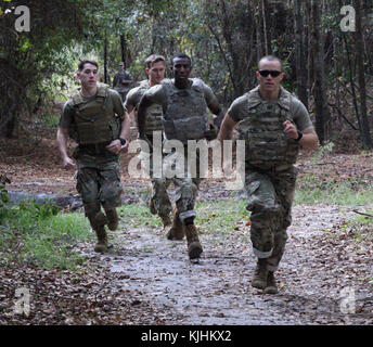 Soldiers of 92nd Engineer Battalion, compete in the Marne Mile obstacle ...