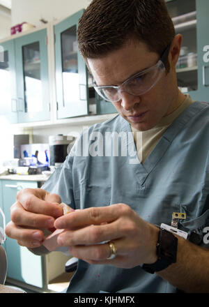 Maj. Matt Checketts, 96th Dental Squadron assistant laboratory flight ...