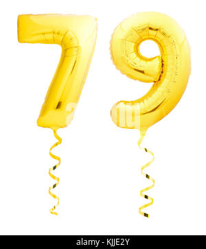 Number 79 seventy nine made of golden inflatable balloons isolated on ...