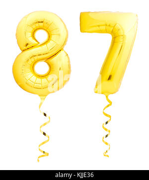 Number 87 eighty seven made of golden inflatable balloons isolated on ...