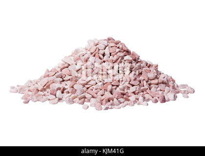 Gravel pile with white gray pink stones in front of brown wooden fence ...