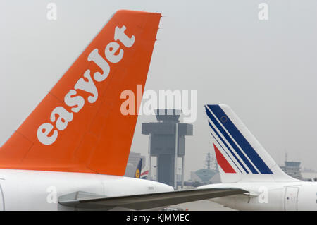 tail fins of Easyjet Airbus A319-111 planes on the tarmac at Naples ...
