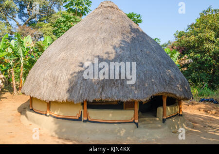 village Guinea Africa mud hut grass roof mango trees Stock Photo - Alamy