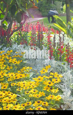 Garden with plenty of blooming Flowers Stock Photo - Alamy