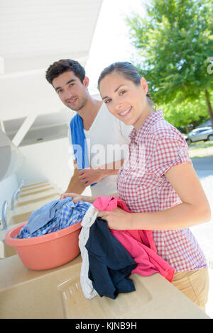 washing clothes at campsite Stock Photo - Alamy