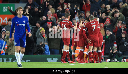 Liverpool players celebrate a goal by Mohamed Salah during the Premier ...