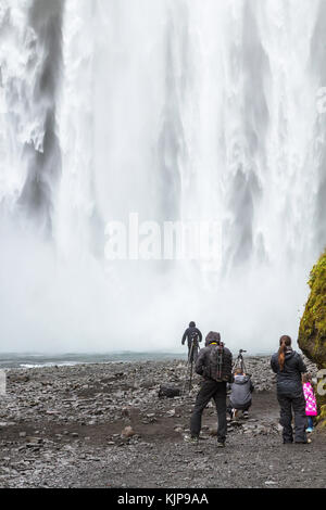 People take in the view of the waterfalls on the Mississippi River in ...