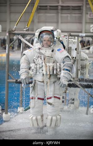 NASA astronaut Rex Walheim trains on the Advanced Resistive Exercise ...