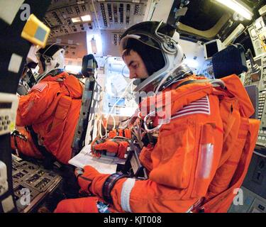 The space shuttle Atlantis astronauts left to right, mission ...
