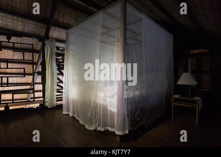 Traditional wooden bed in a Vietnamese home in Kenh Ga, Vietnam Stock ...