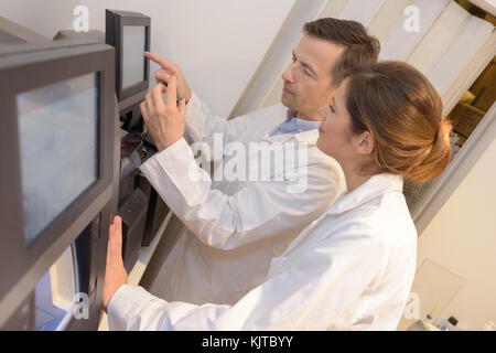 opticians working in the laboratory Stock Photo - Alamy