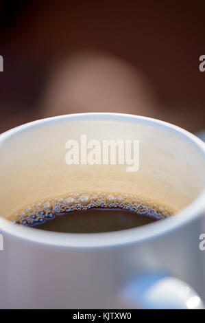 Half full coffee cup for caffeine Stock Photo - Alamy