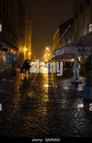 Timisoara streets on a rainy night Stock Photo - Alamy