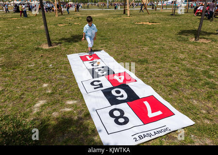 Unidentified children play hopscotch at a park .ISTANBUL, TURKEY,MAY 13 ...